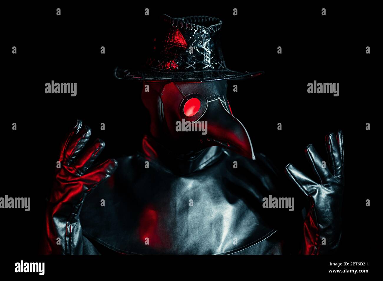 Portrait of plague doctor with crow-like mask isolated on black ...