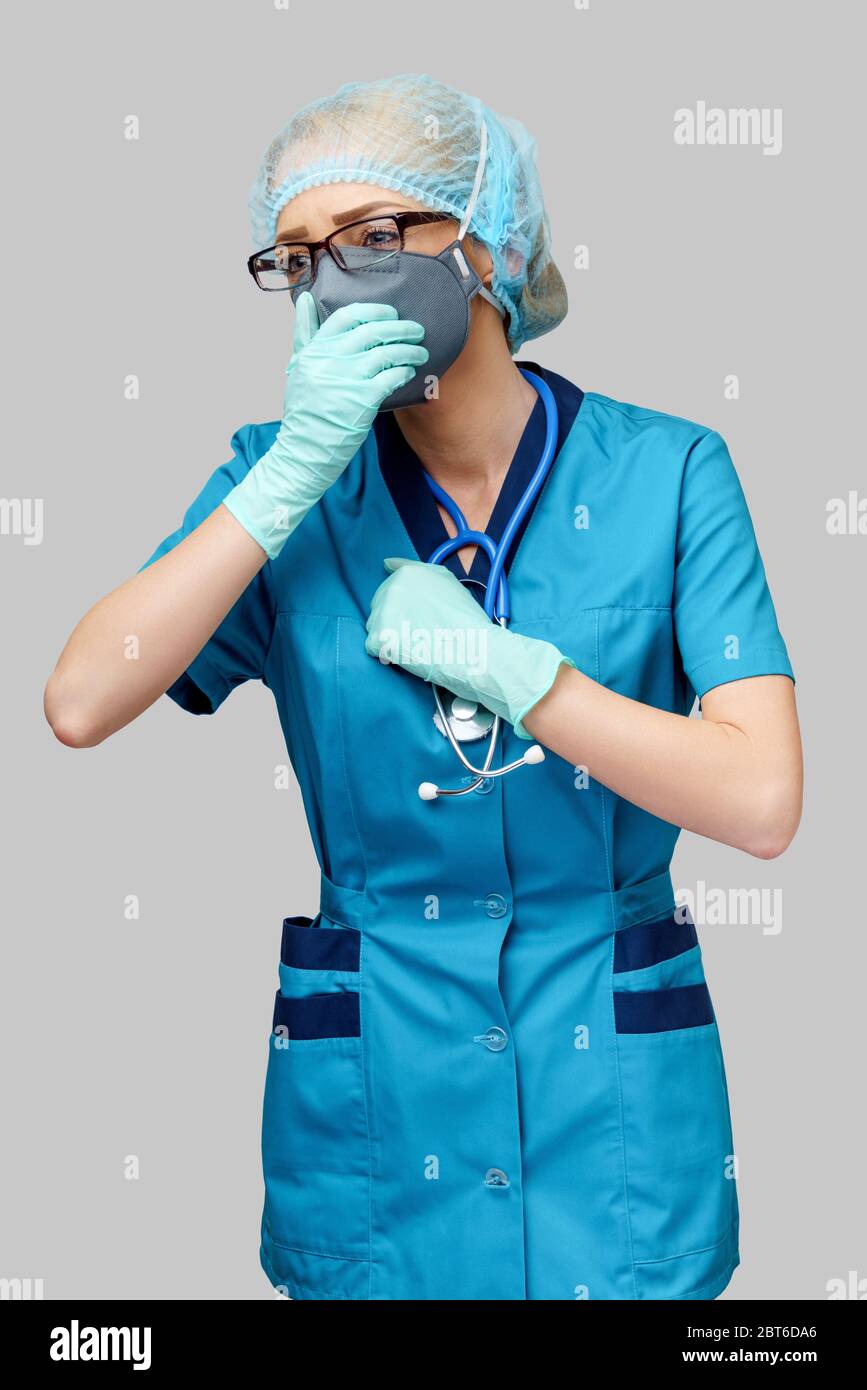 medical doctor nurse woman wearing protective mask and rubber or latex ...