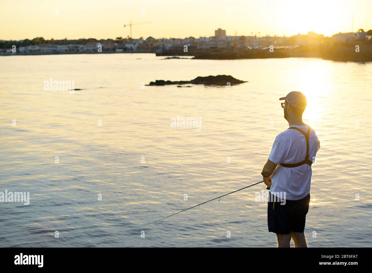 Man catching a fish hi-res stock photography and images - Alamy