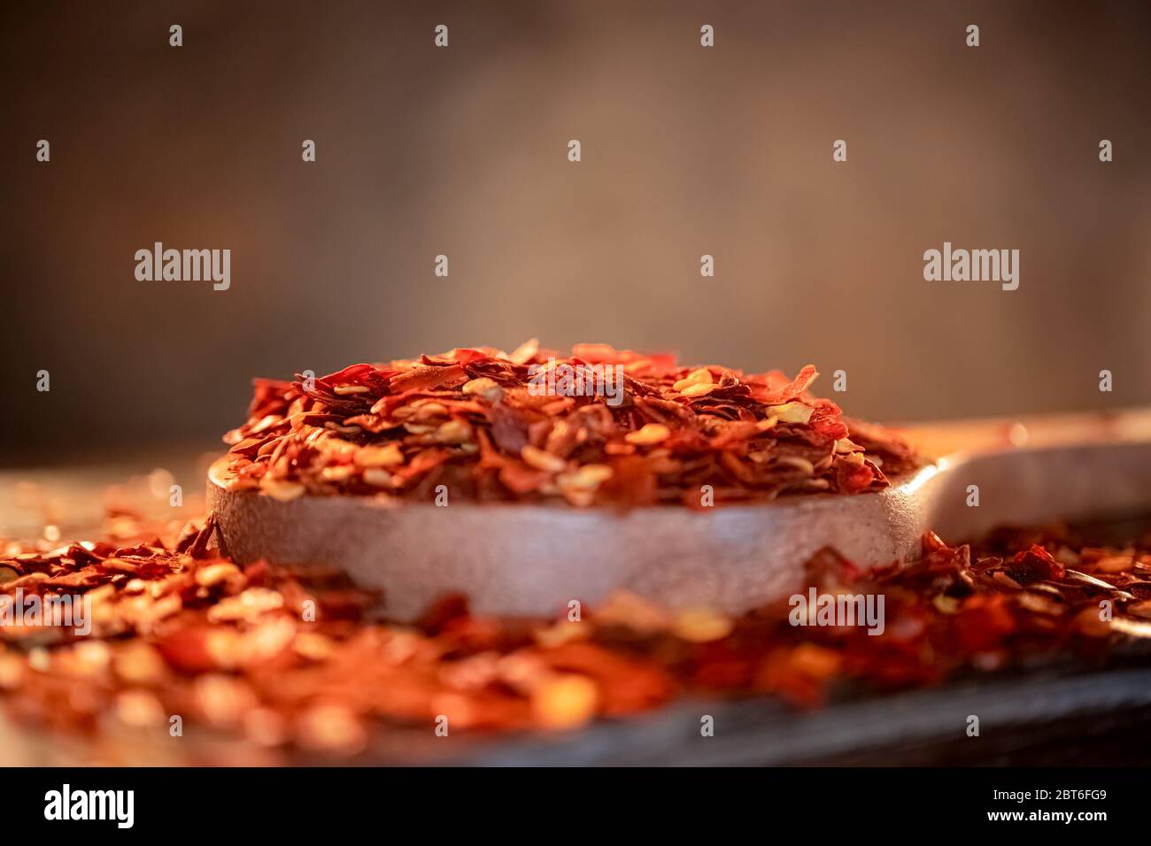 Red chili pepper flakes hi-res stock photography and images - Alamy