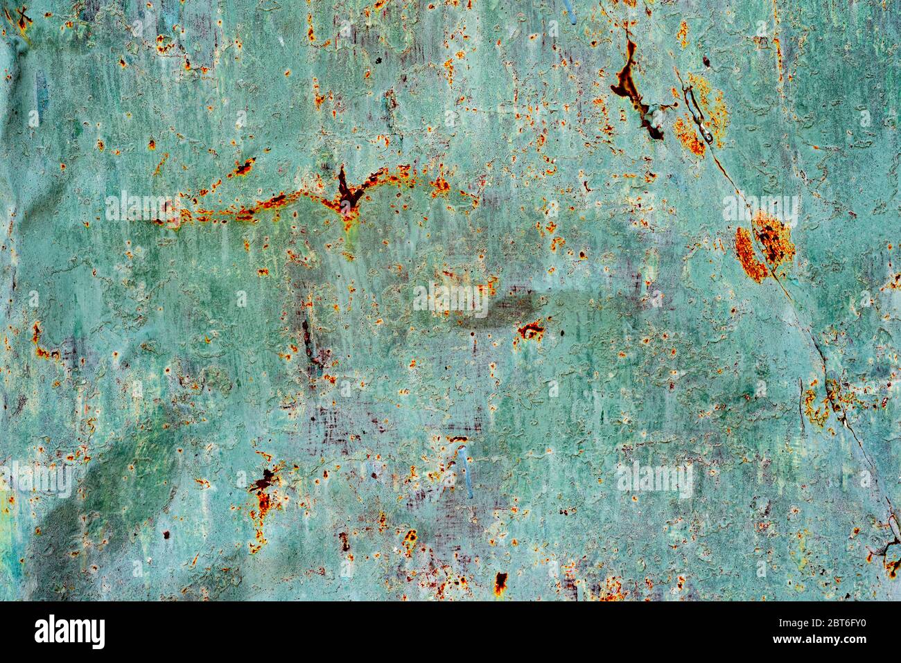 Texture of a metal wall with cracks and scratches which can be used as ...