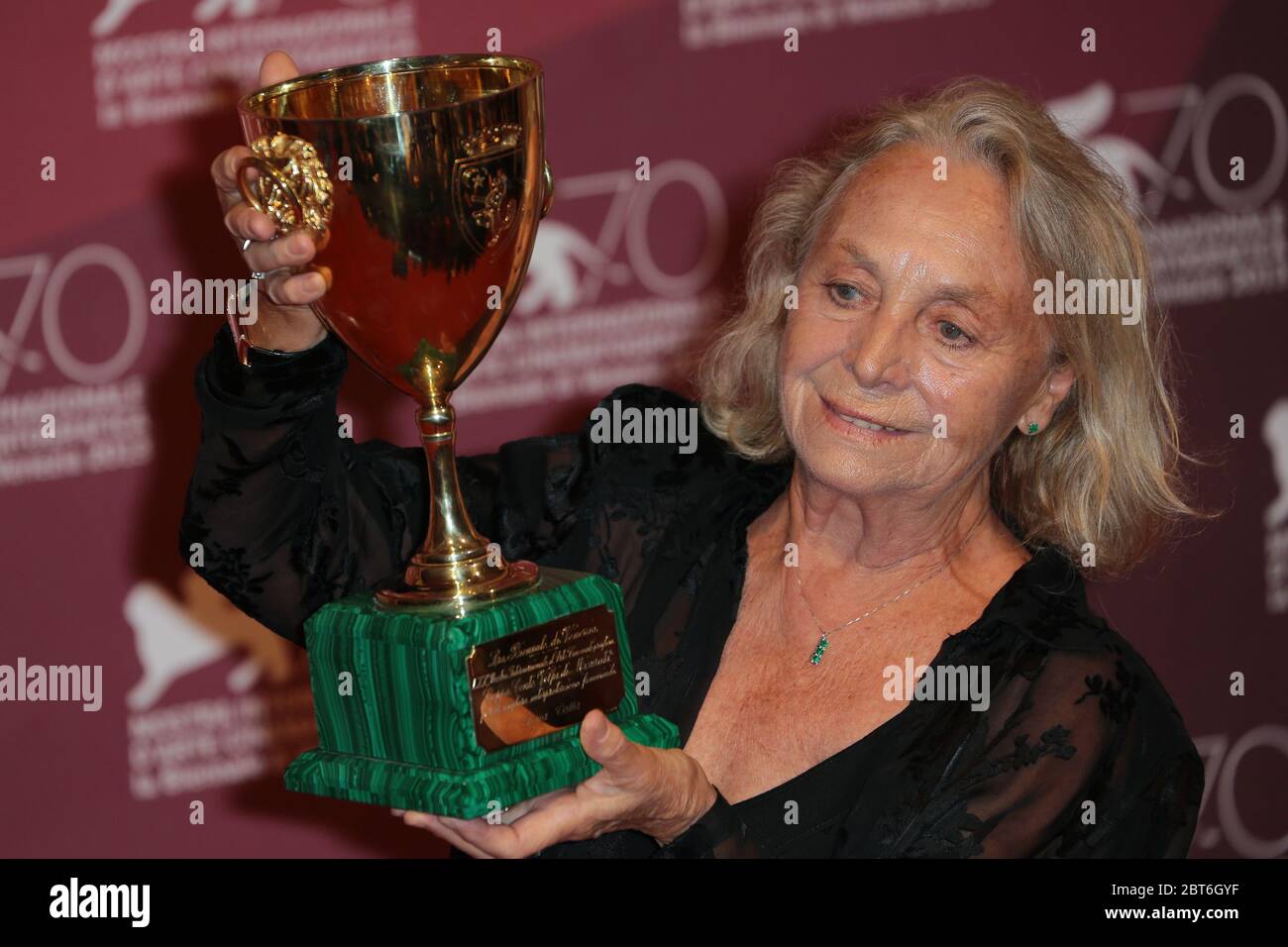 VENICE, ITALY - SEPTEMBER 07: Elena Cotta poses with the Coppa Volpi ...