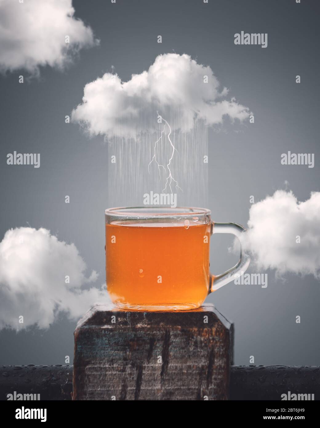 cloud raining tea inside cup Stock Photo - Alamy