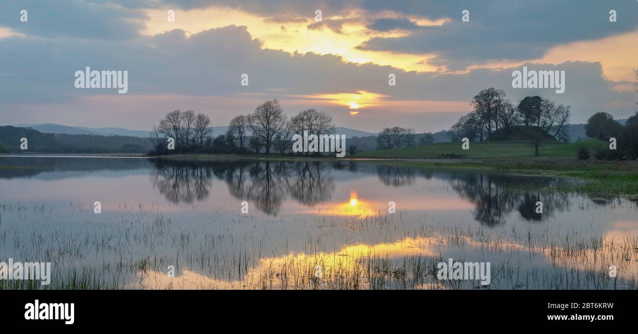 Loch Ken at Parton Motte with setting sun Stock Photo - Alamy