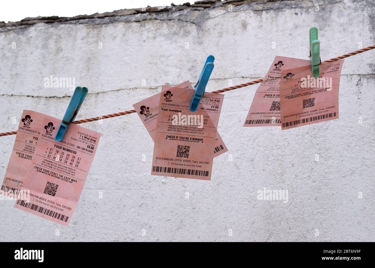 Uk lotto lottery tickets clipped hi-res stock photography and images ...
