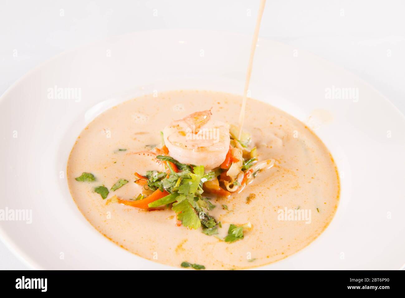 Thai soup with tiger shrimp and vegetable Stock Photo - Alamy