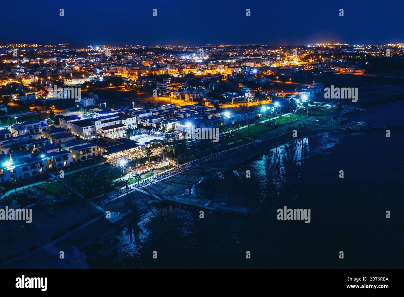 Aerial panorama of Paphos at night, Cyprus seaside from above ...