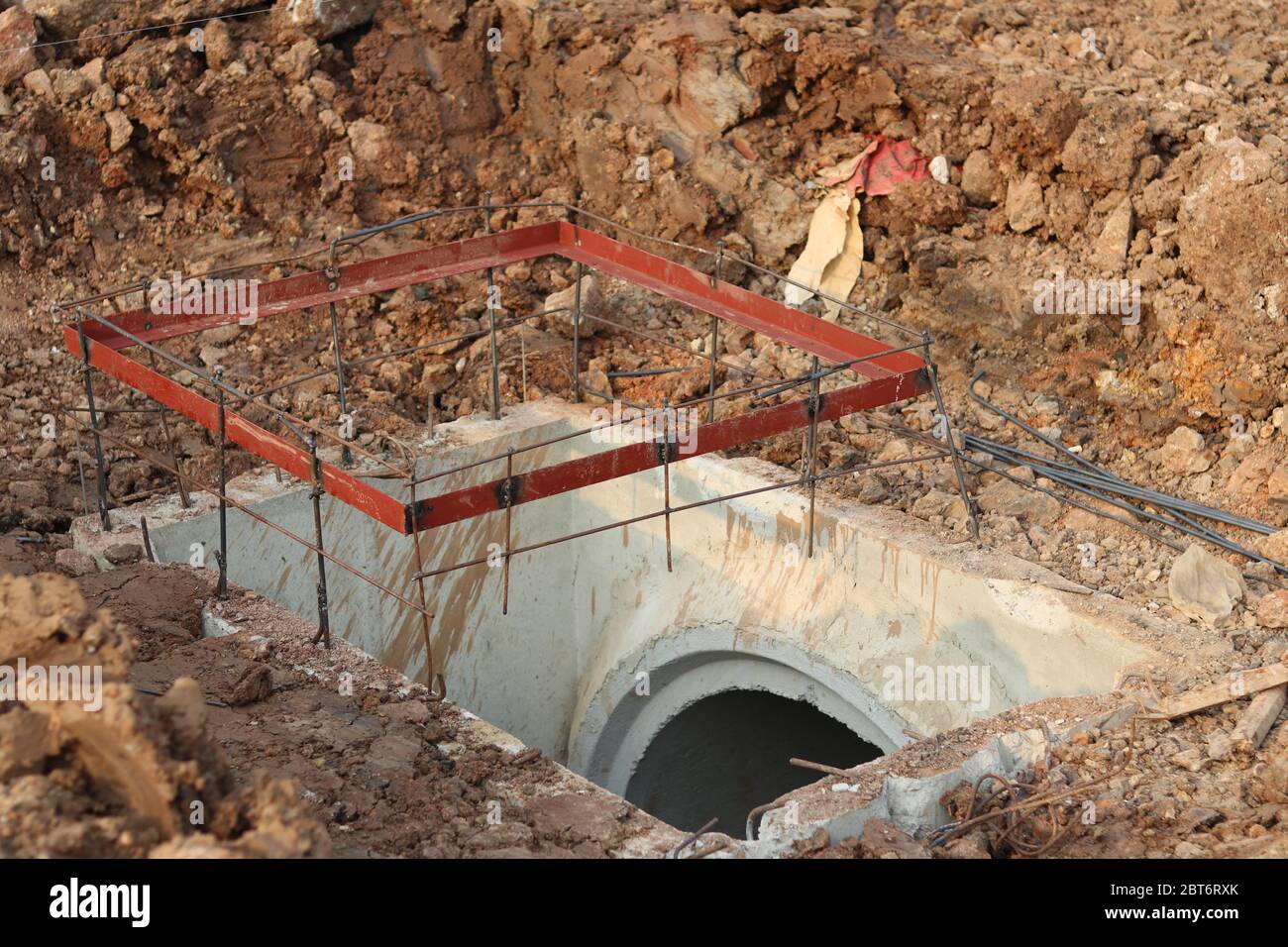 Steel frame for casting manhole covers. Public drainage pipe laying ...