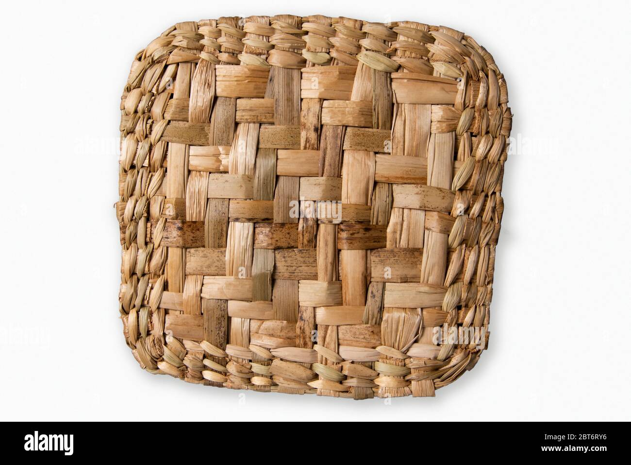 straw mat in a white background Stock Photo - Alamy