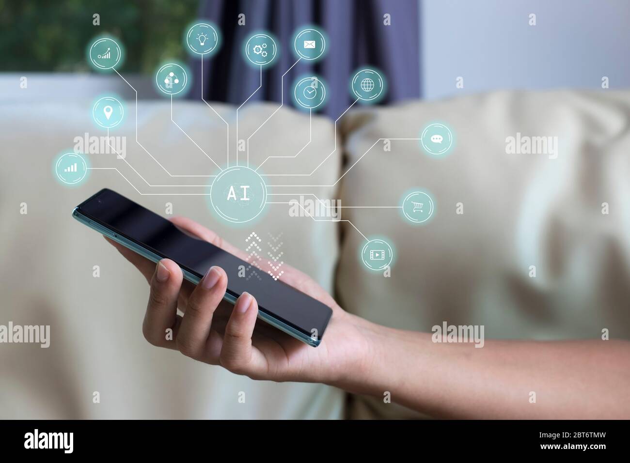 Mobile phone with communication icon floating above Stock Photo - Alamy