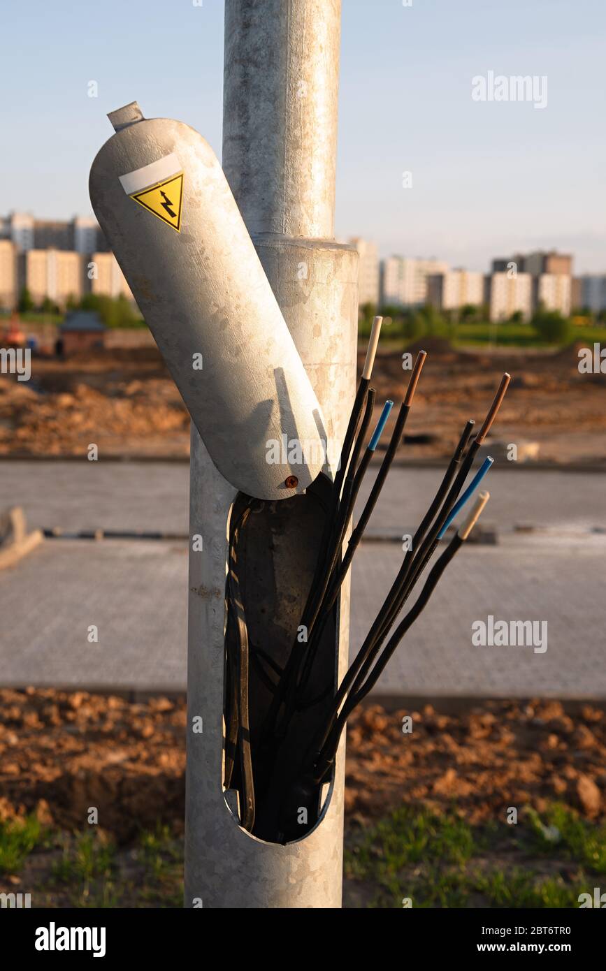 hazardous area, metal pole, electrical wires are torn off, a danger ...