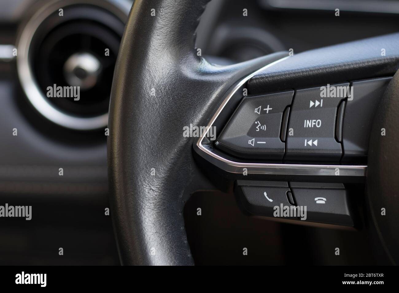 Control panel at the steering wheel for control the use of various ...