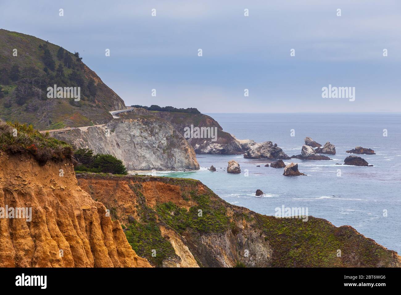 View o the Pacific Coast in California. High cliffs and ocean water ...
