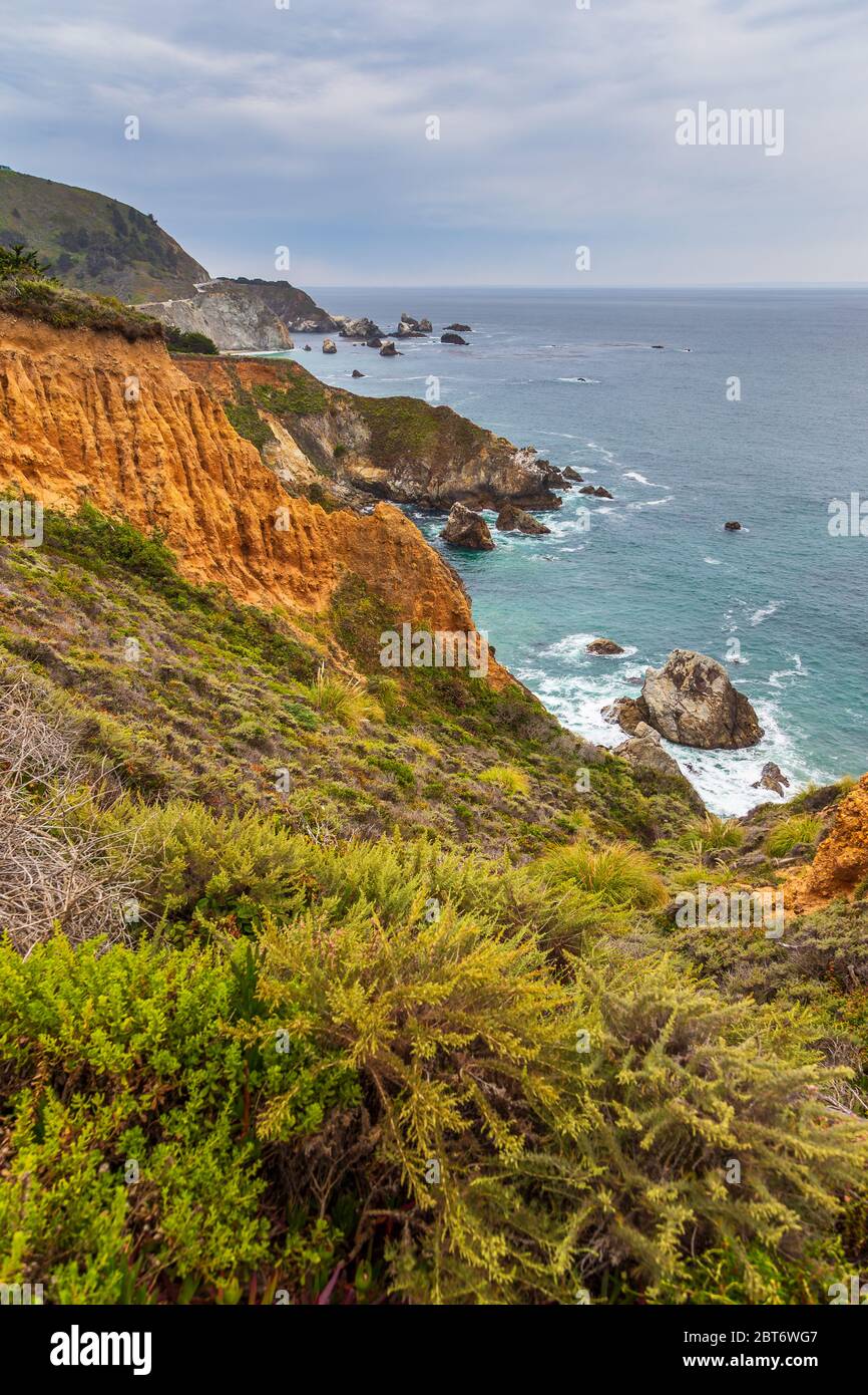View o the Pacific Coast in California. High cliffs and ocean water ...