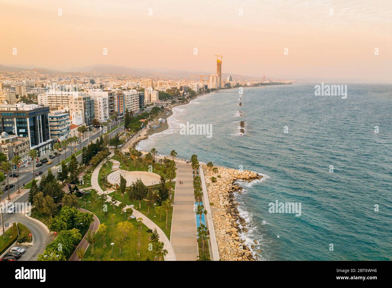 Aerial view of Limassol city coast in Cyprus. Walk path Molos Park with ...