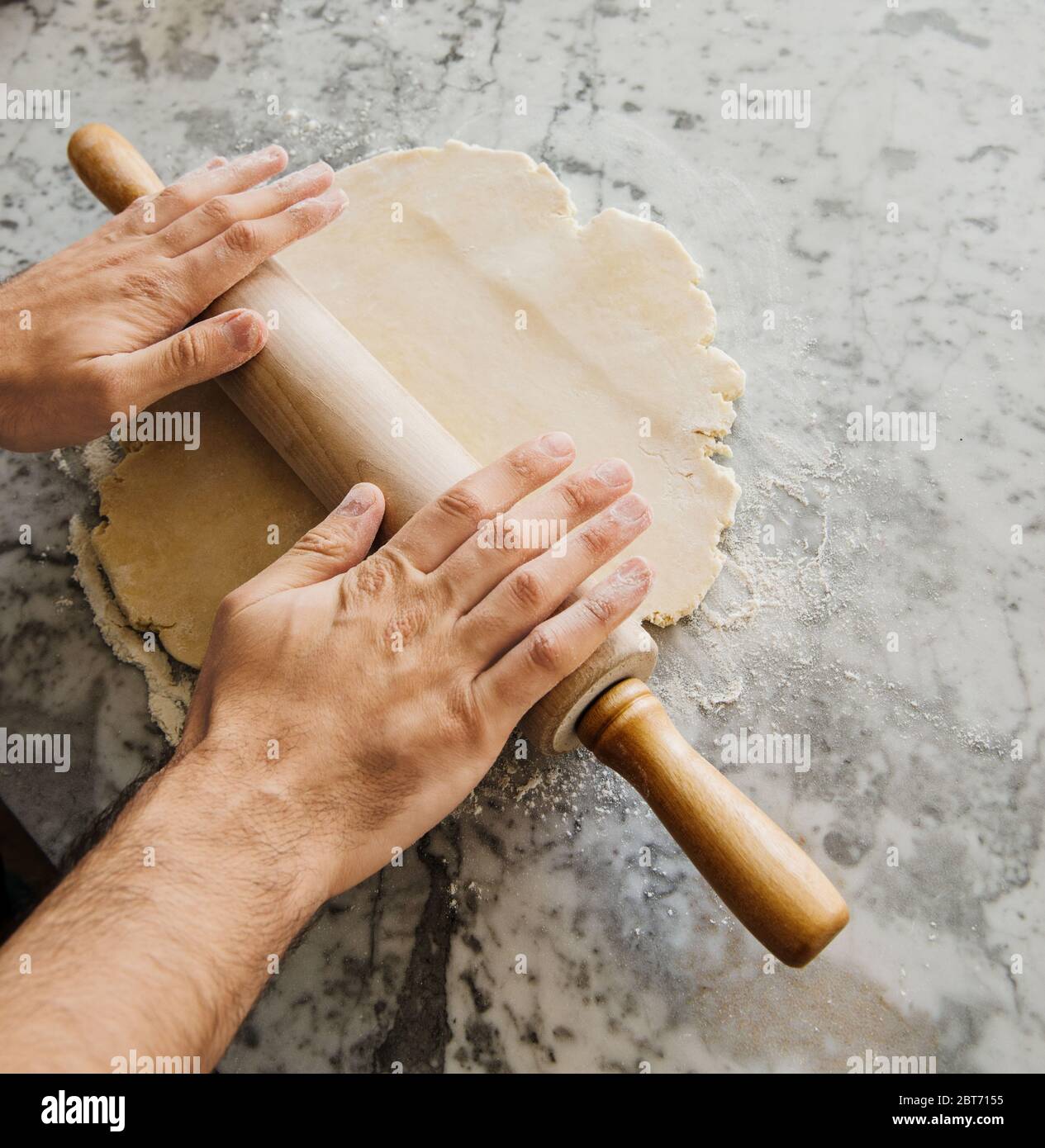 hands kneading/rolling dough Stock Photo - Alamy