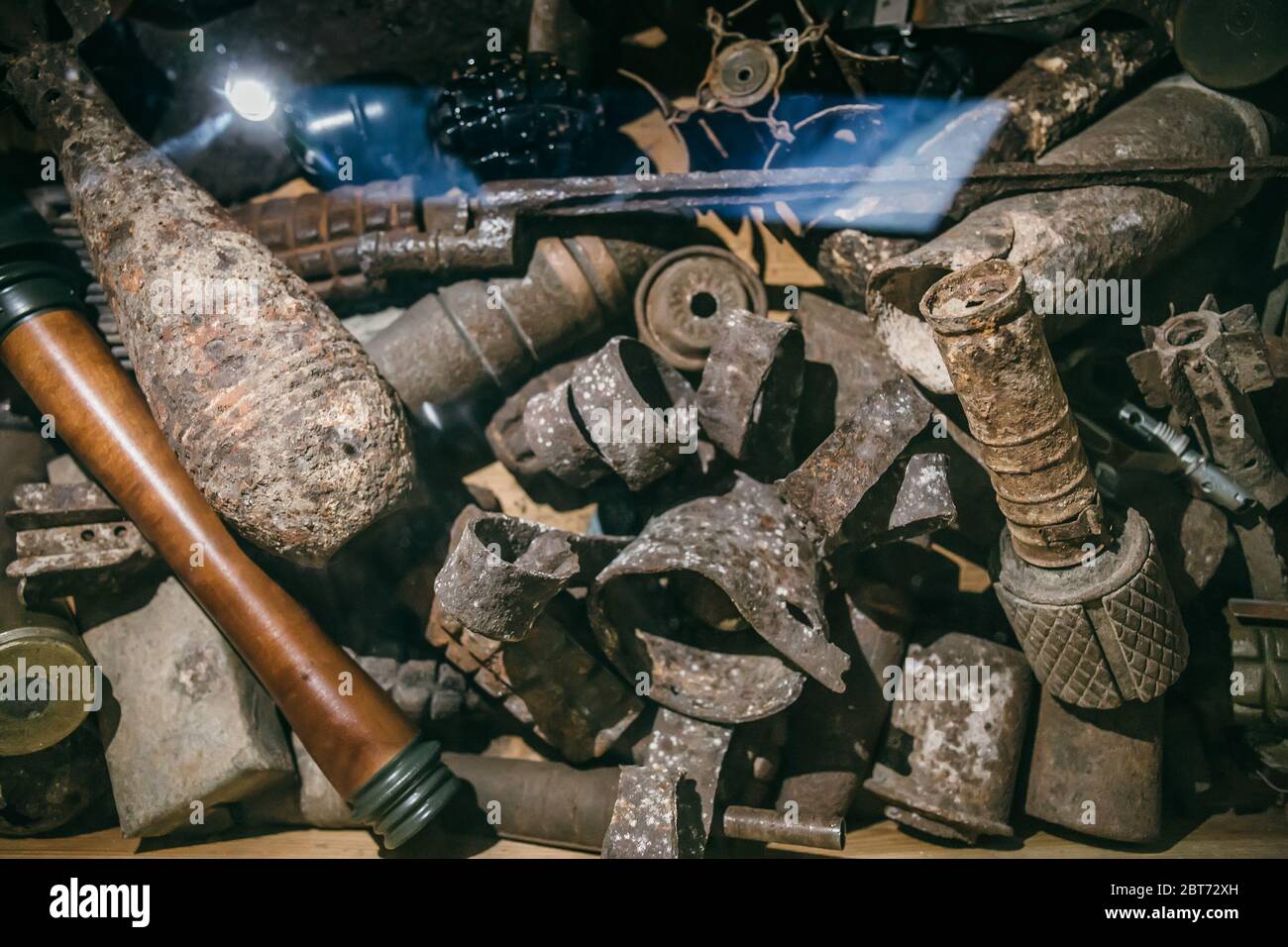 Old rusty shells, grenades and bullets of World War 2, close up ...