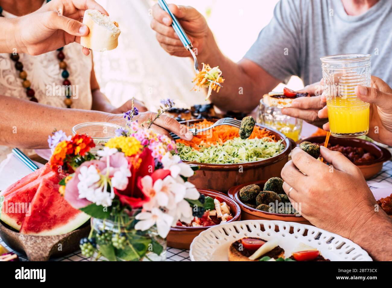 Family at lunch scene with unrecognizable caucasian mixed ages people ...