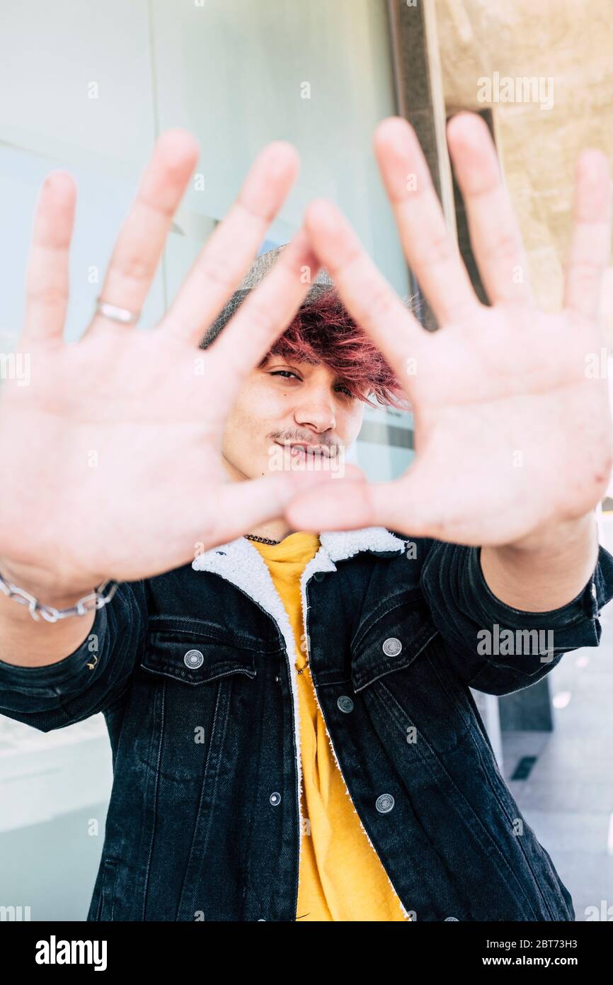 Hands on view portrait with alternative handsome generation z young man ...