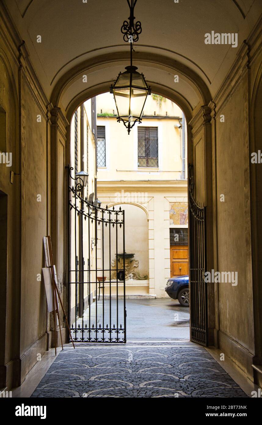 Italian passage with Gate Stock Photo - Alamy