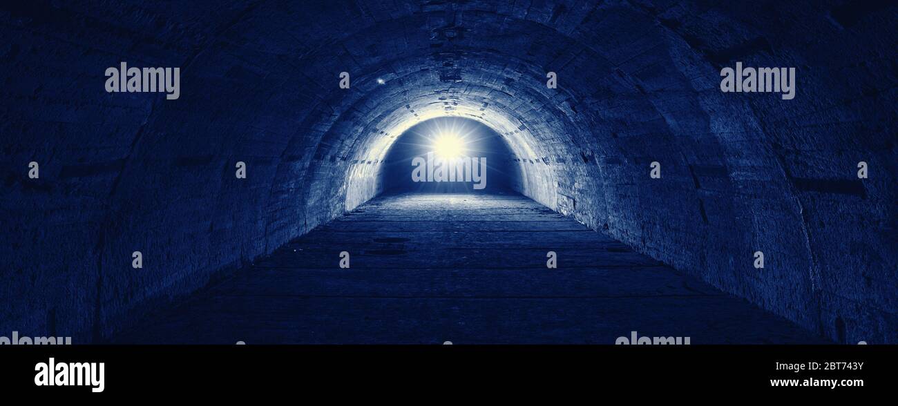 Panoramic image of tunnel with light in end in Phantom Blue trendy ...