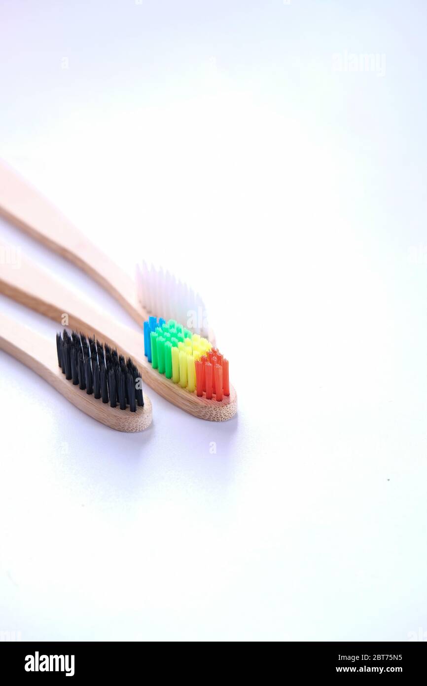 Eco friendly bamboo tooth brush on white background Stock Photo - Alamy