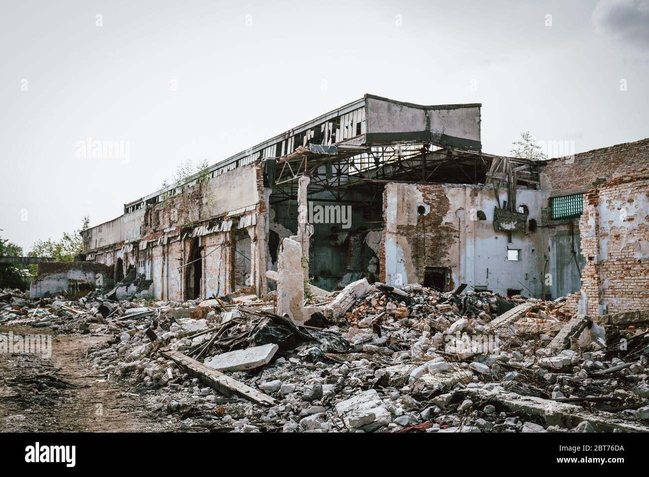 Abandoned, ruined and destroyed building in military conflict area ...