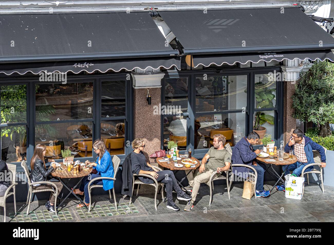 People enjoying the sunshine sitting outside The Spaghetti house on ...