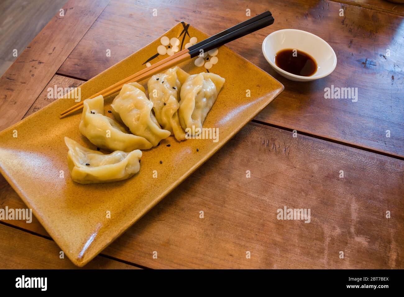 Handmade Chinese dumplings Jiaozi with black sesame seeds beautifully ...