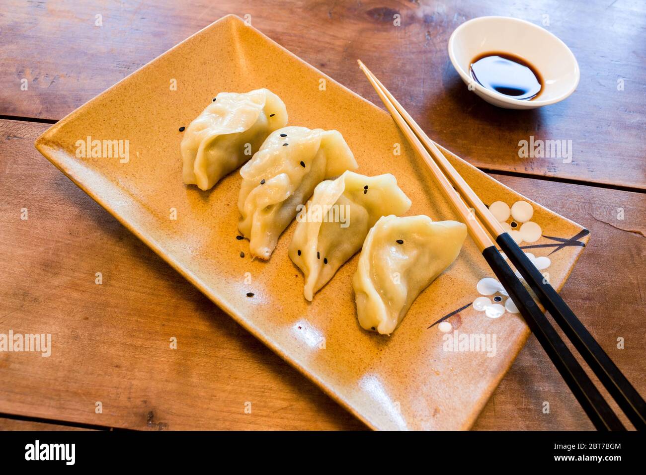 Handmade Chinese dumplings Jiaozi with black sesame seeds beautifully ...