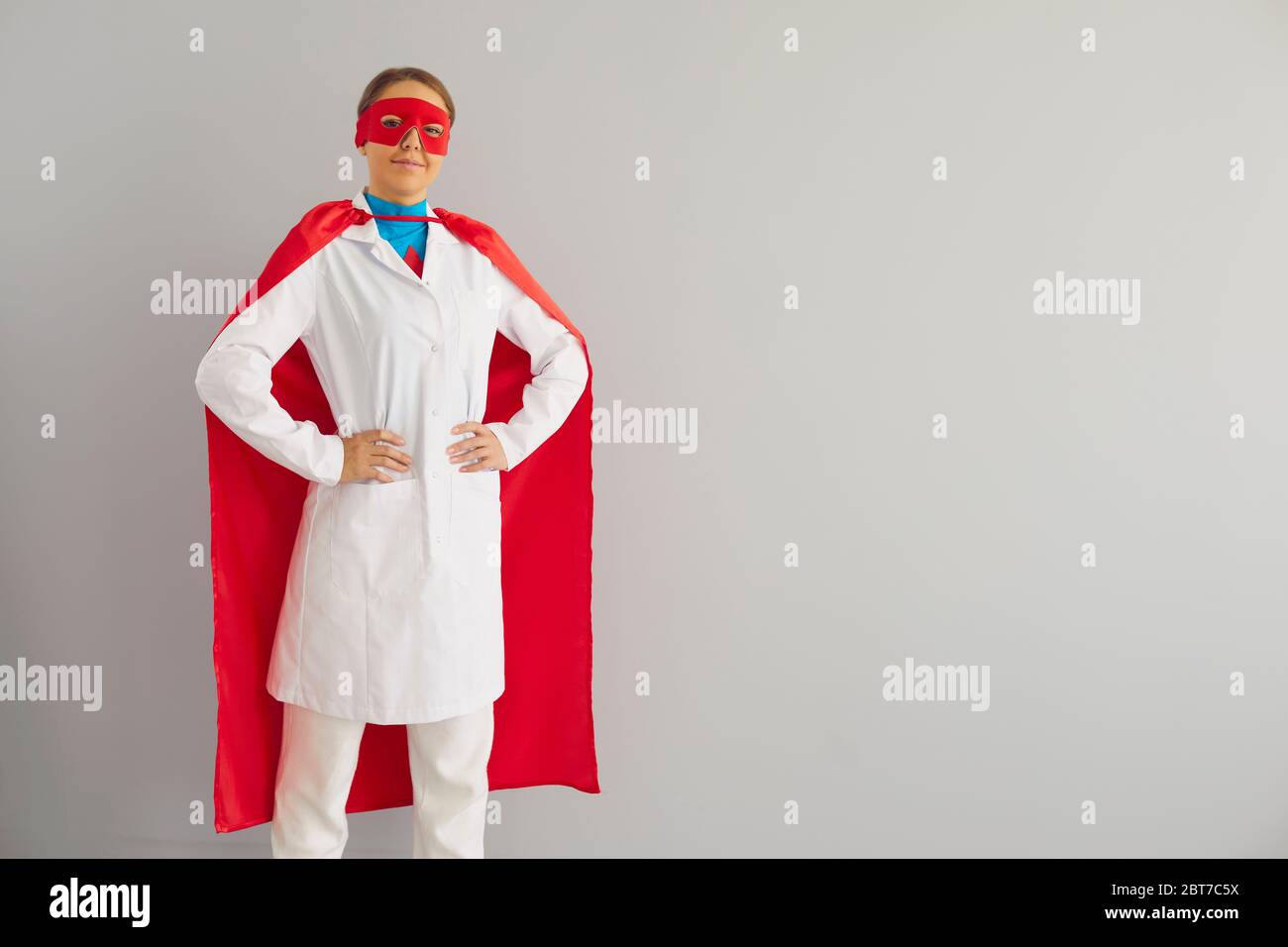 Doctor or nurse superhero on a gray background. The concept of medical ...