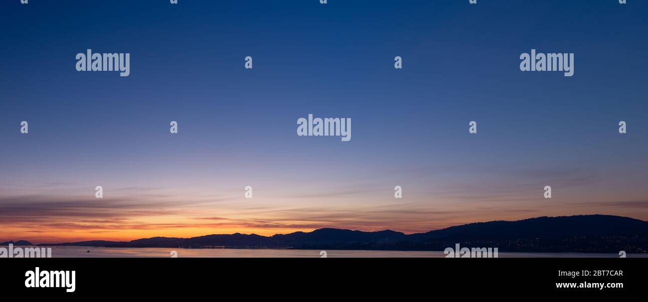 Panoramic night sky with some clouds Stock Photo - Alamy