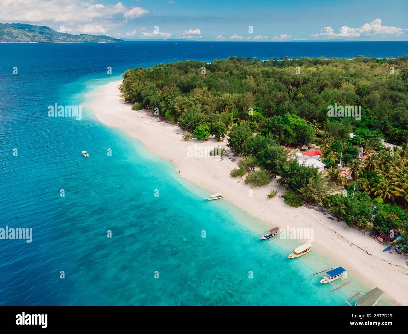 Tropical island with luxury beach and turquoise ocean. Aerial view ...