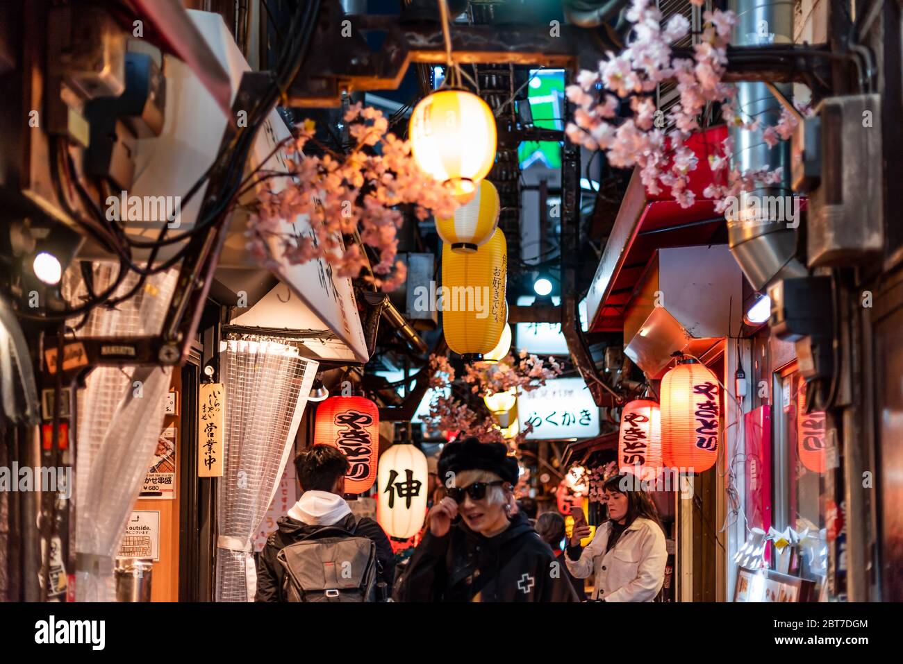 Tokyo, Japan - April 3, 2019: Memory lane alley with spring cherry ...
