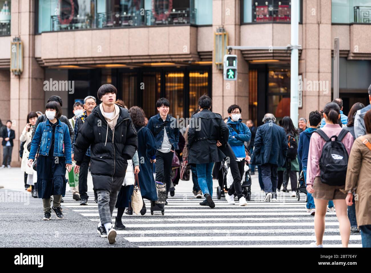 Tokyo, Japan - March 31, 2019: Ginza district ward with red signal ...