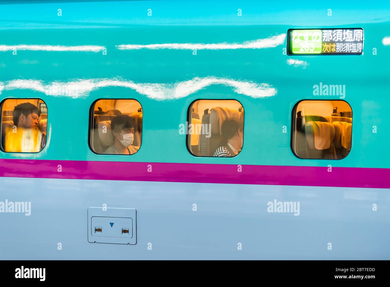 Utsunomiya, Japan - April 5, 2019: Train station with people sitting in ...