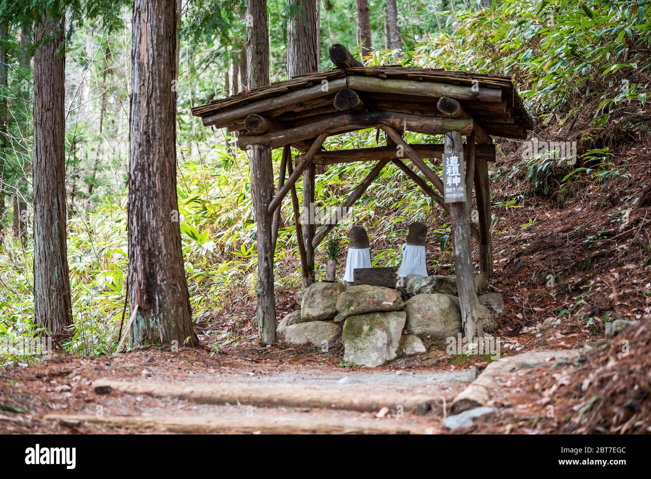 Takayama, Japan - April 6, 2019: Small wooden stone temple shinto ...