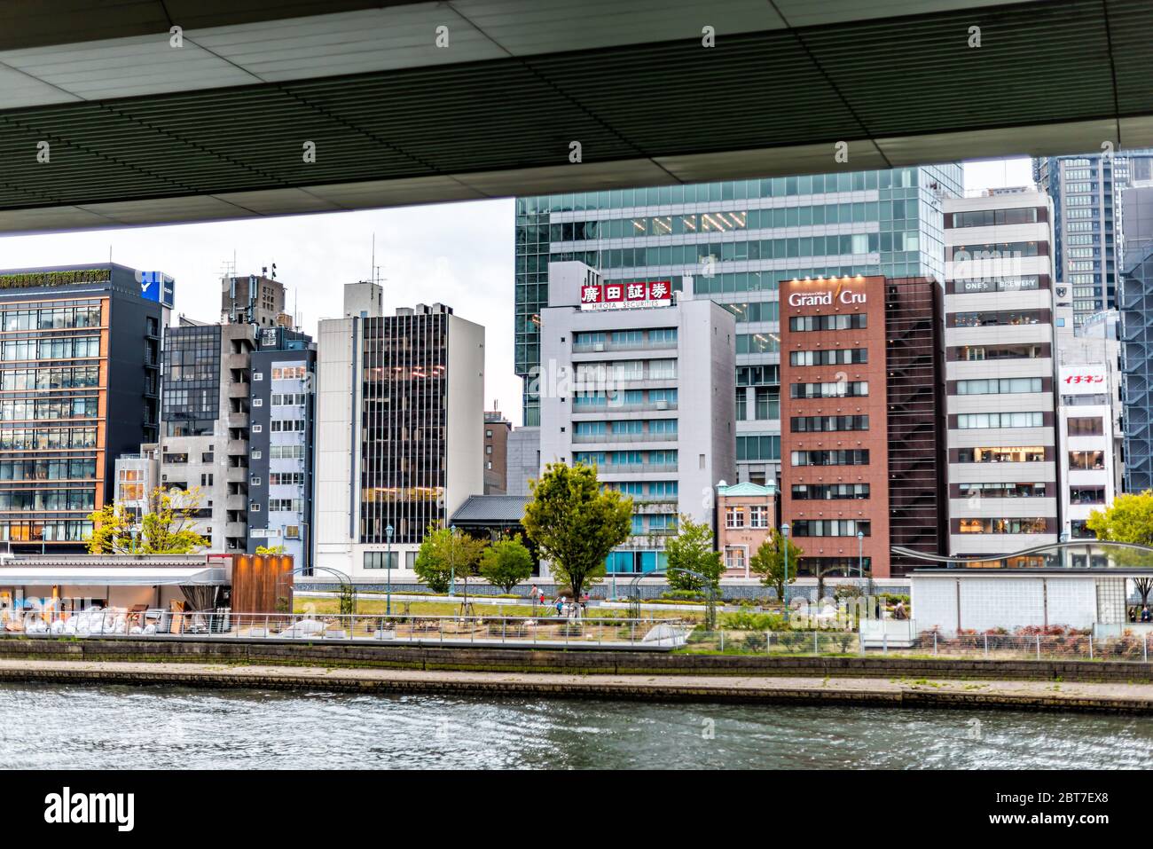 Osaka, Japan - April 13, 2019: River water view of cityscape downtown ...