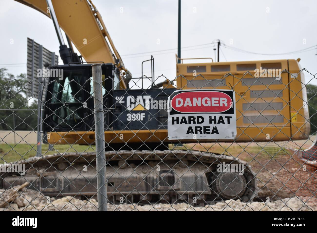 Sign board : Danger Hard hat area Stock Photo - Alamy
