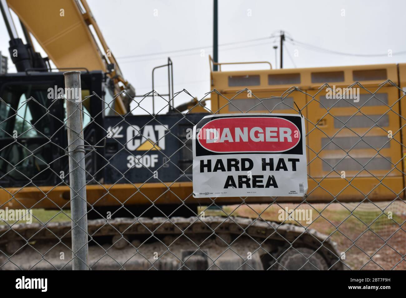 Sign board : Danger Hard hat area Stock Photo - Alamy