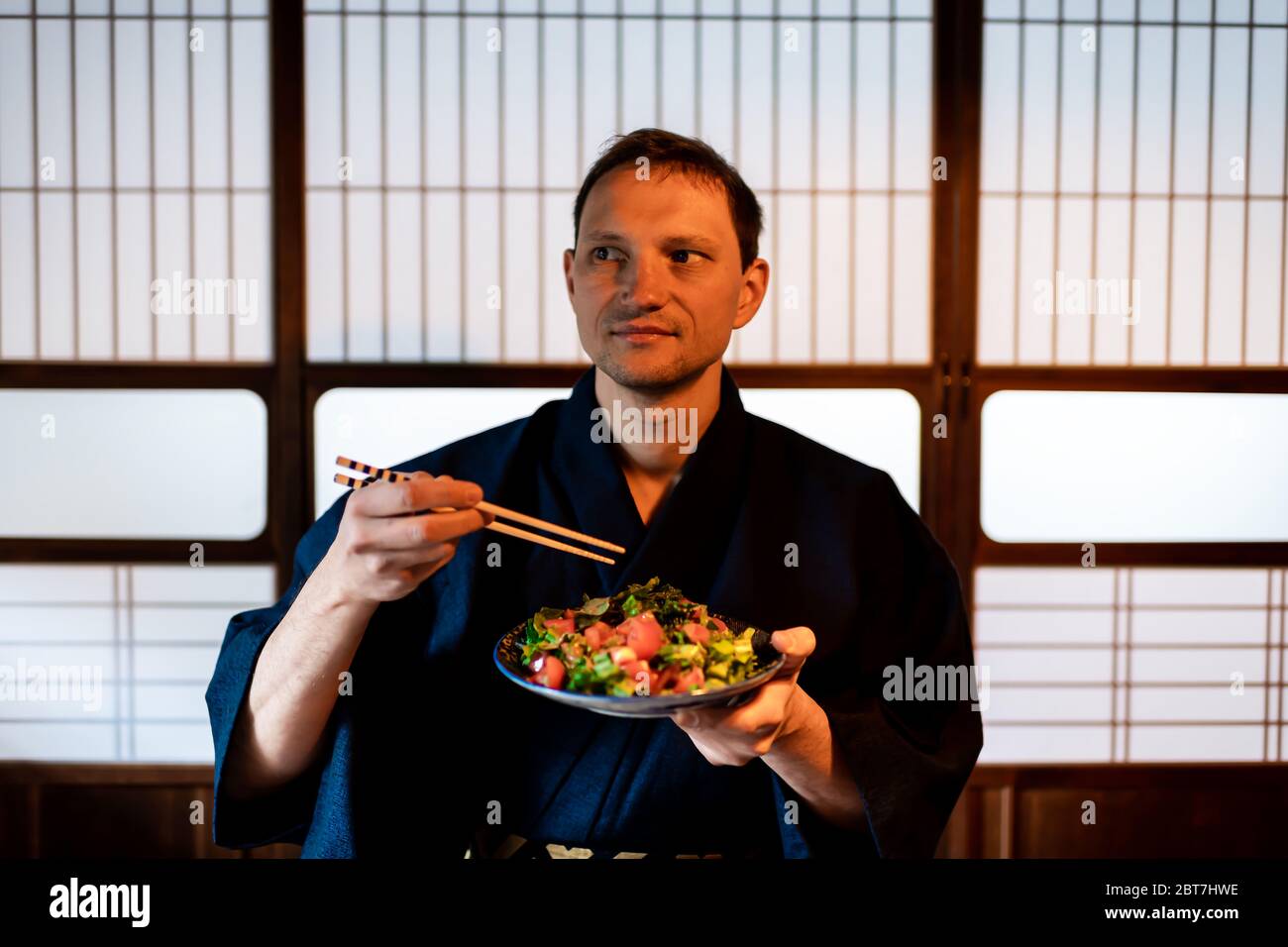 Traditional japanese house or ryokan restaurant with tourist man in ...