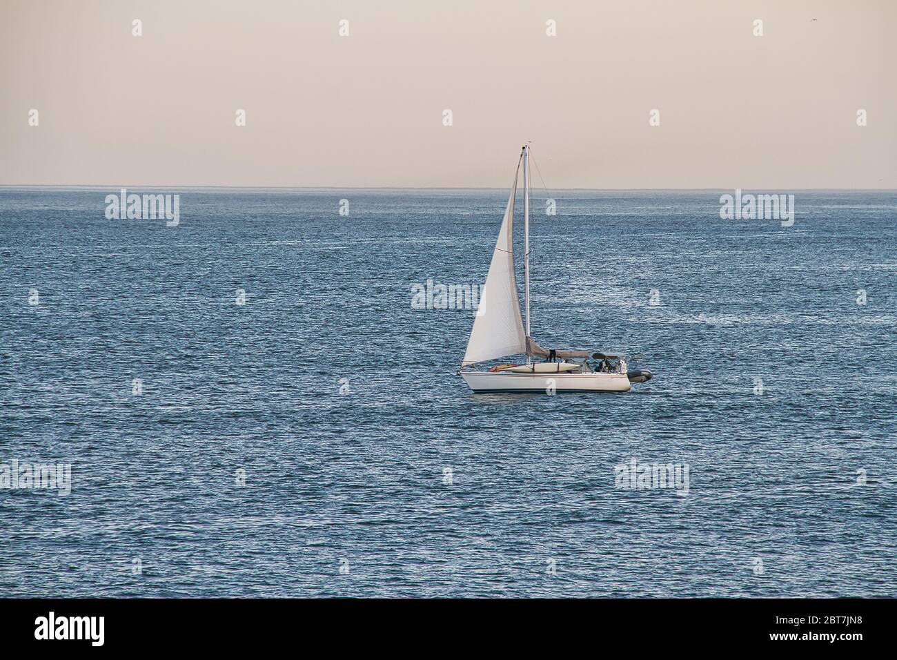 Sailboat on the Open Ocean Stock Photo - Alamy