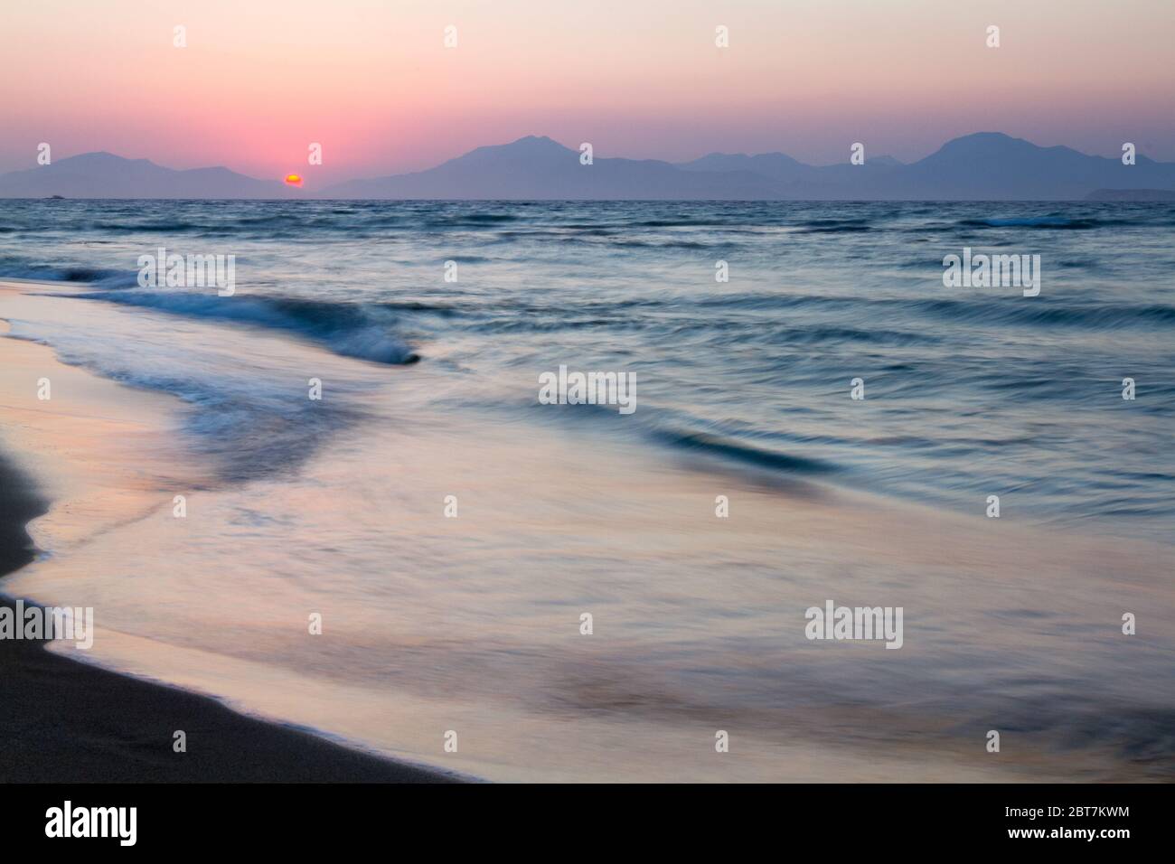 Sunset on a beach. Kos, Greece. motion Stock Photo - Alamy