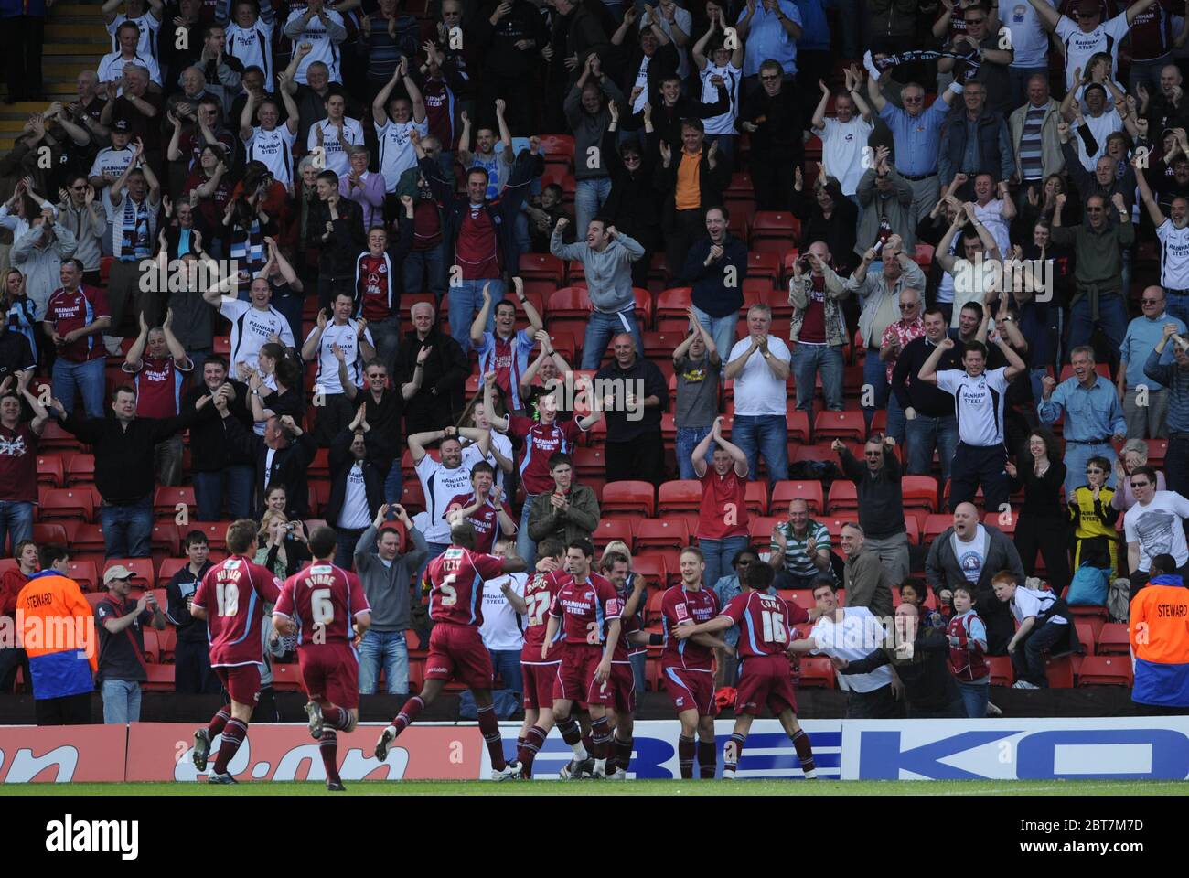 WATFORD, UK. APRIL 26: Scunthorpe Fans celebrate Paul Hayes' goalduring ...