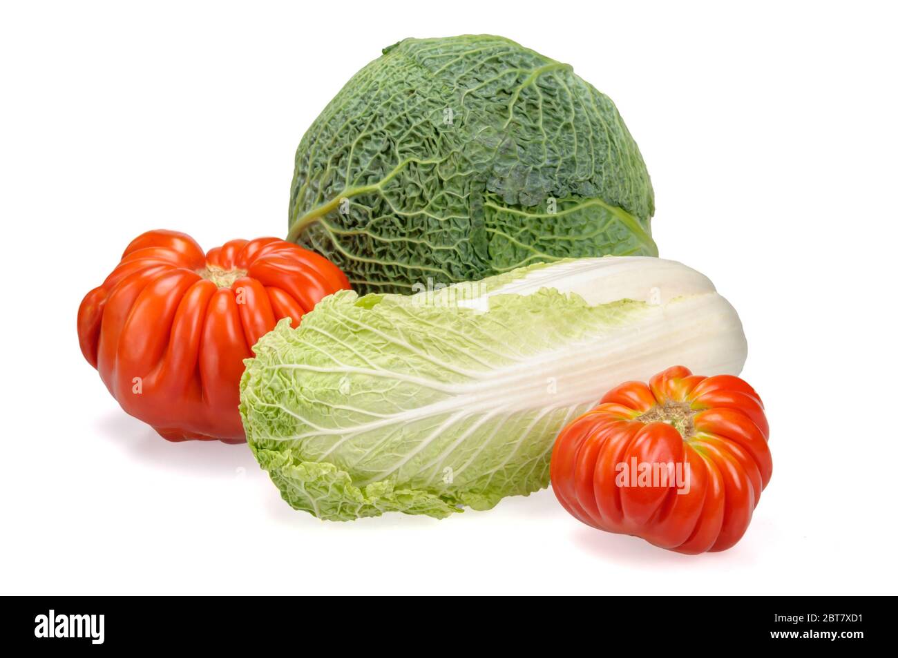 Organic vegetables on a white background. Savoy cabbage and Beijing ...