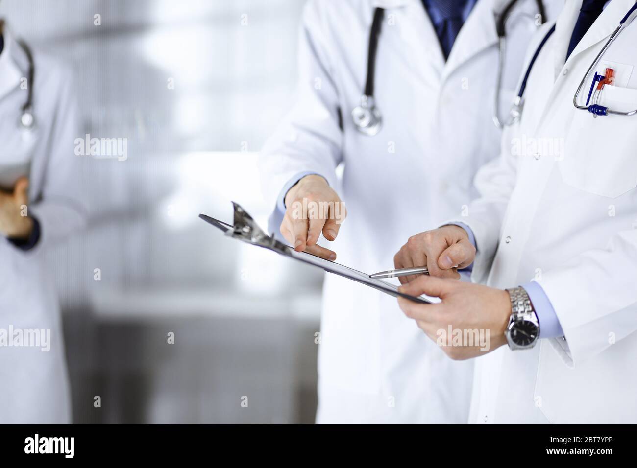 Two doctors discuss medication hi-res stock photography and images - Alamy