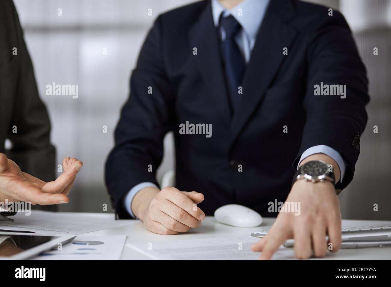 Business people using computer while working together in modern office ...