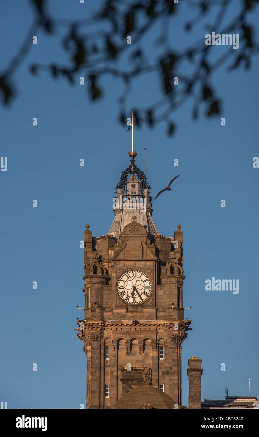 Balmoral Hotel clocktower from Princes Street Edinburgh, with blue sky ...