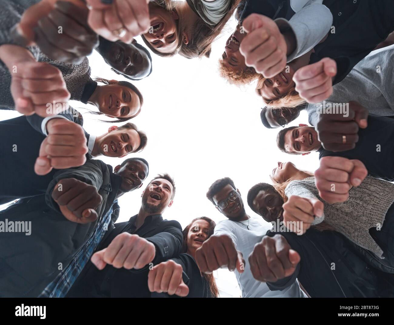 group of diverse ambitious young people standing in a circle Stock ...