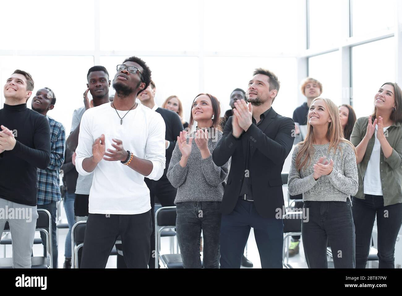 group of diverse young people applauding together Stock Photo - Alamy